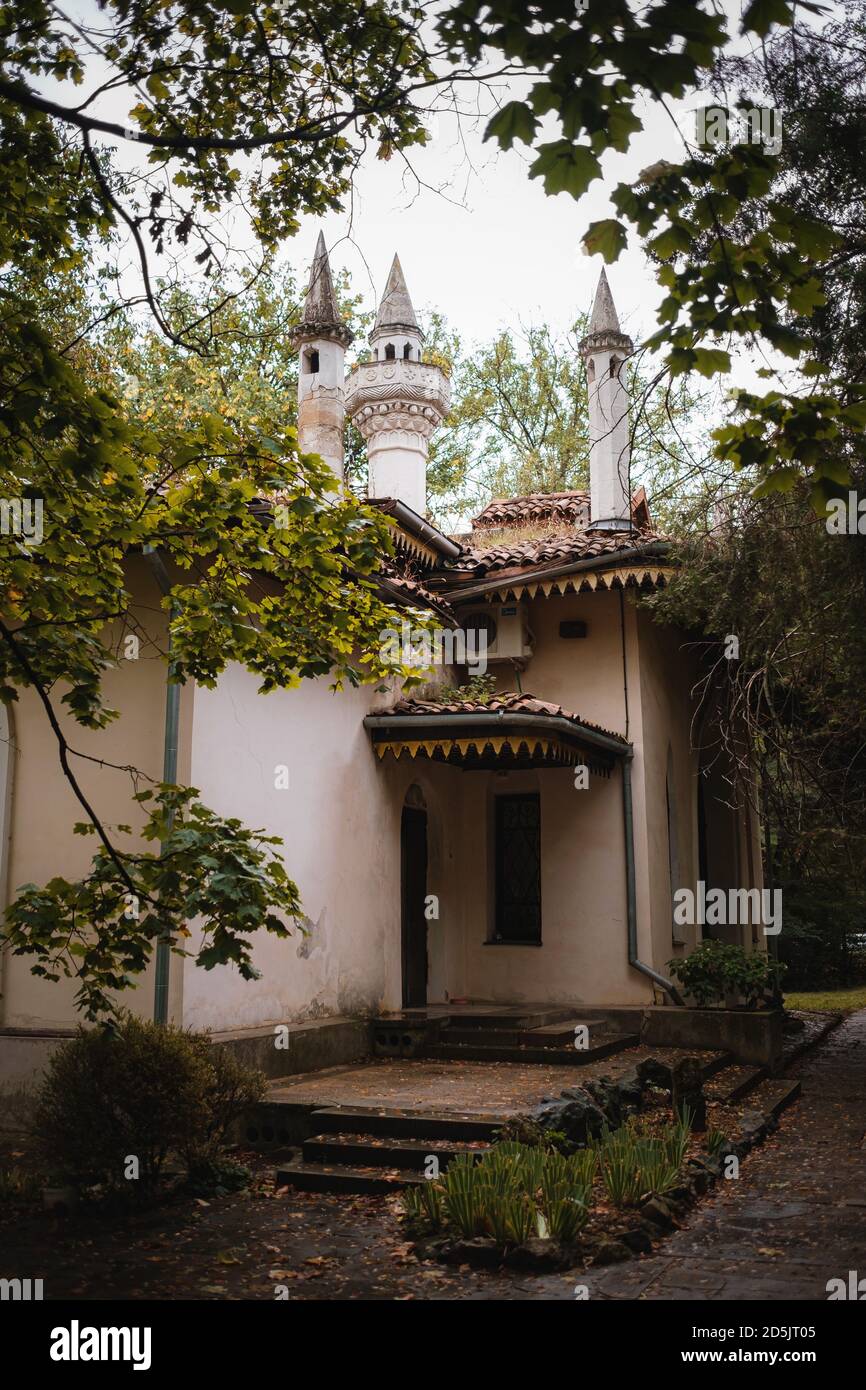 small mosque in the botanical garden. the beginning of autumn ...