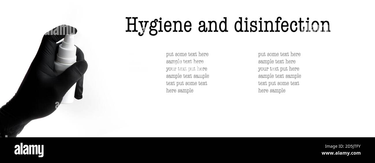 Hand in black nitrile glove holds spray for disinfection. free space ...