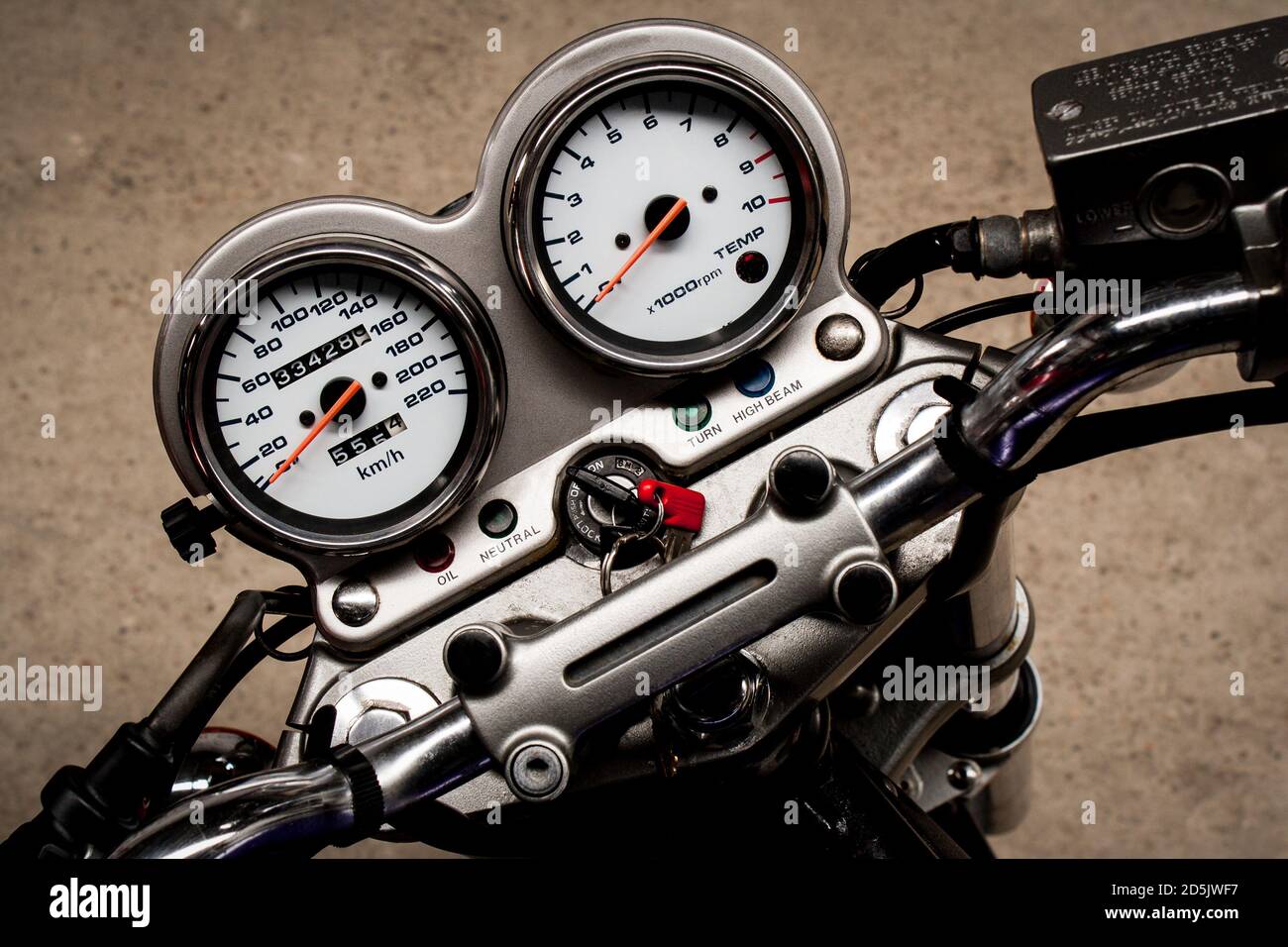 The arrow speedometer of a motorcycle on the steering wheel that stands ...