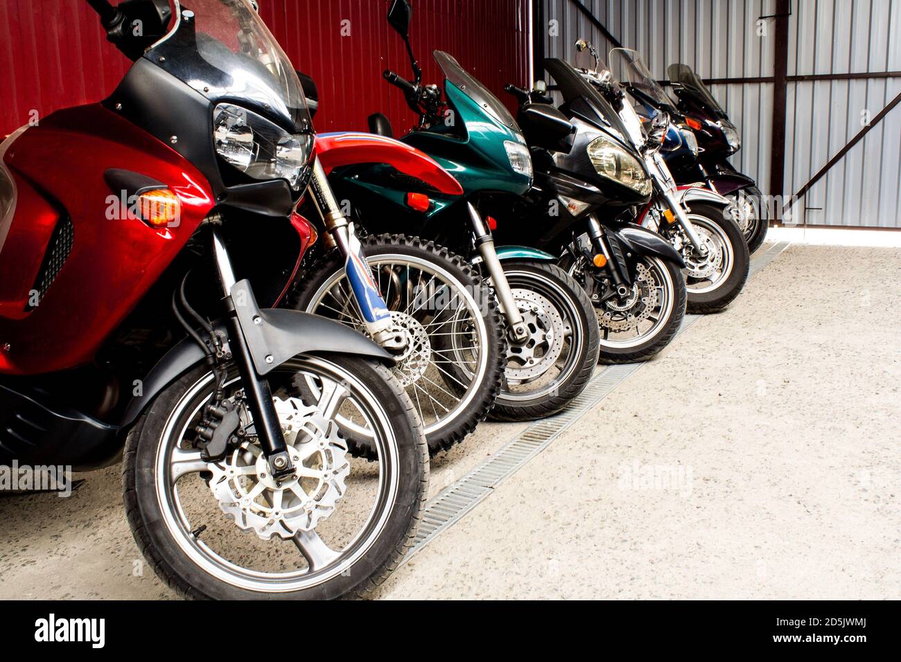 Colored sports, road beautiful bikes in a motor show. Many motorcycles ...