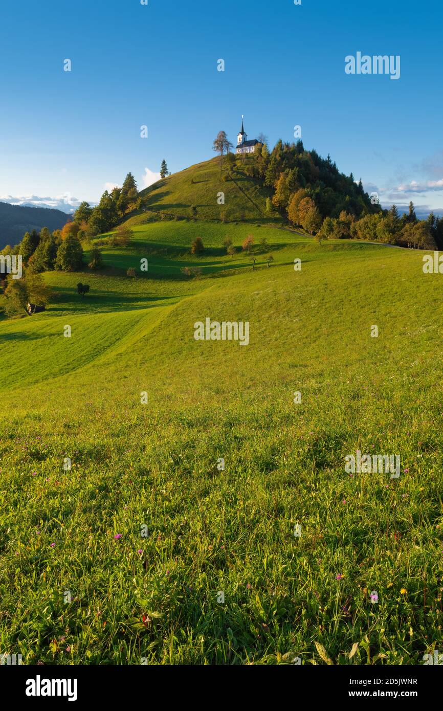 Beautiful countryside scenery with hill and catholic church on top, Sv ...
