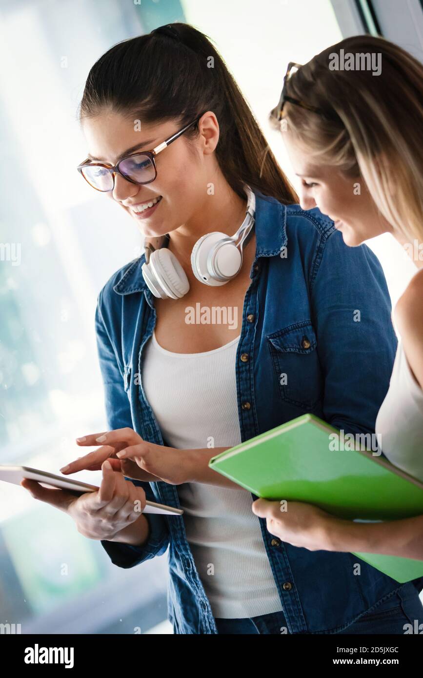Education concept. University students preparing for exam, talking in ...