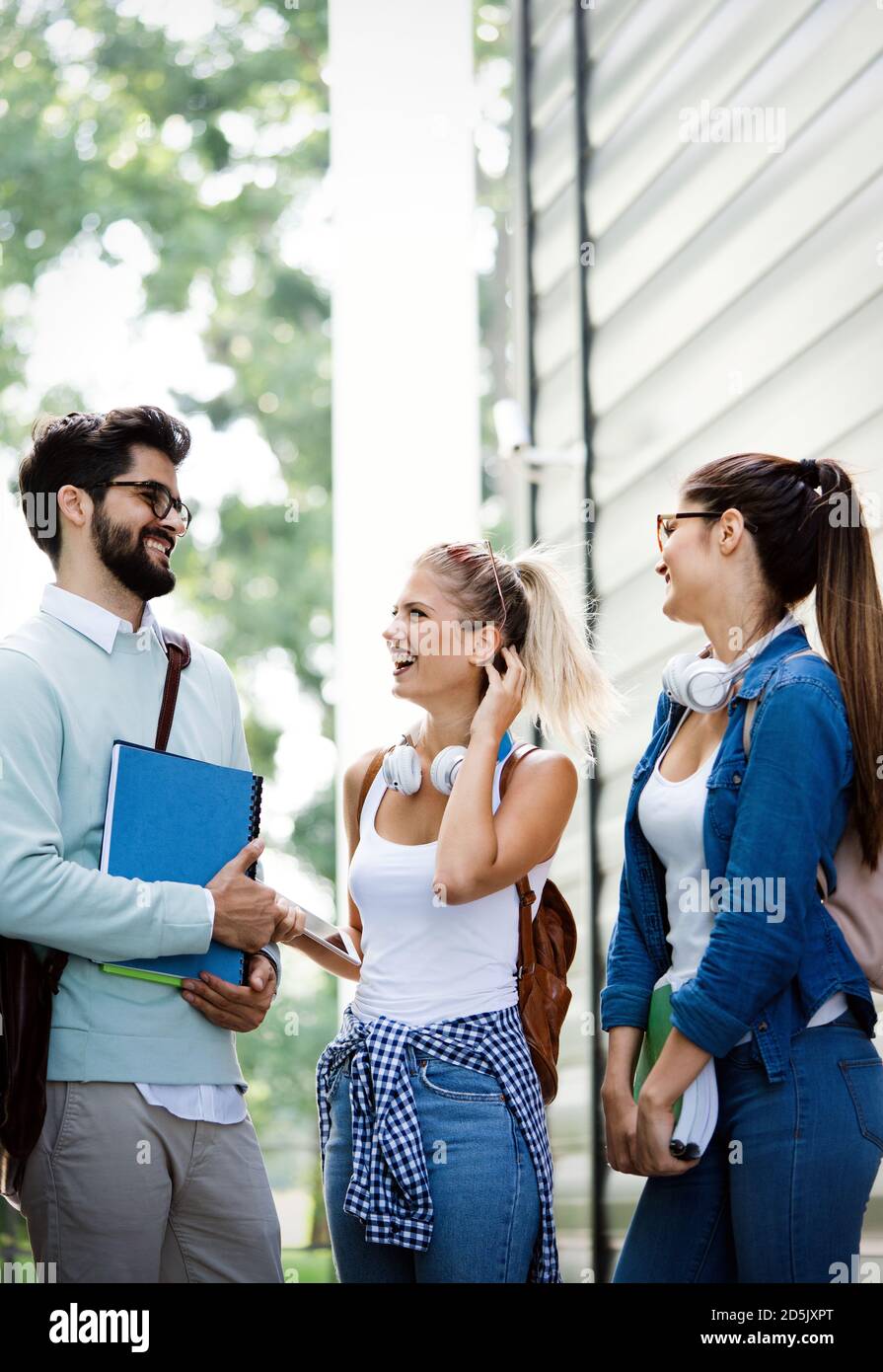 College students studying on university campus outdoor Stock Photo - Alamy