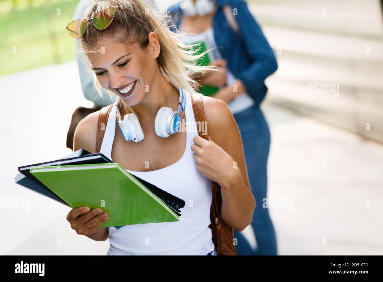 College students studying on university campus outdoor Stock Photo - Alamy