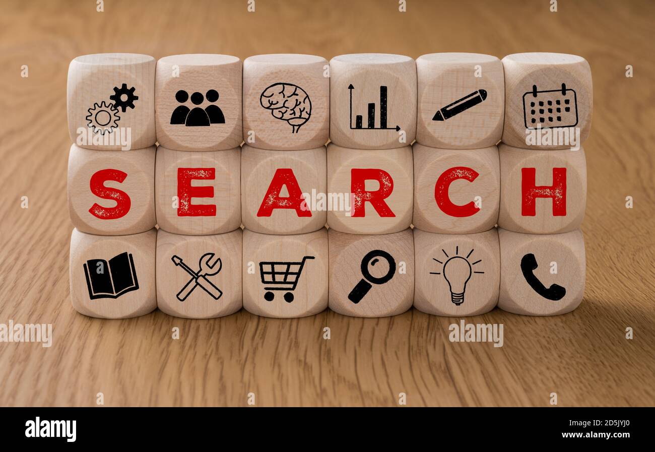 Dice with icons and the word Search Stock Photo - Alamy