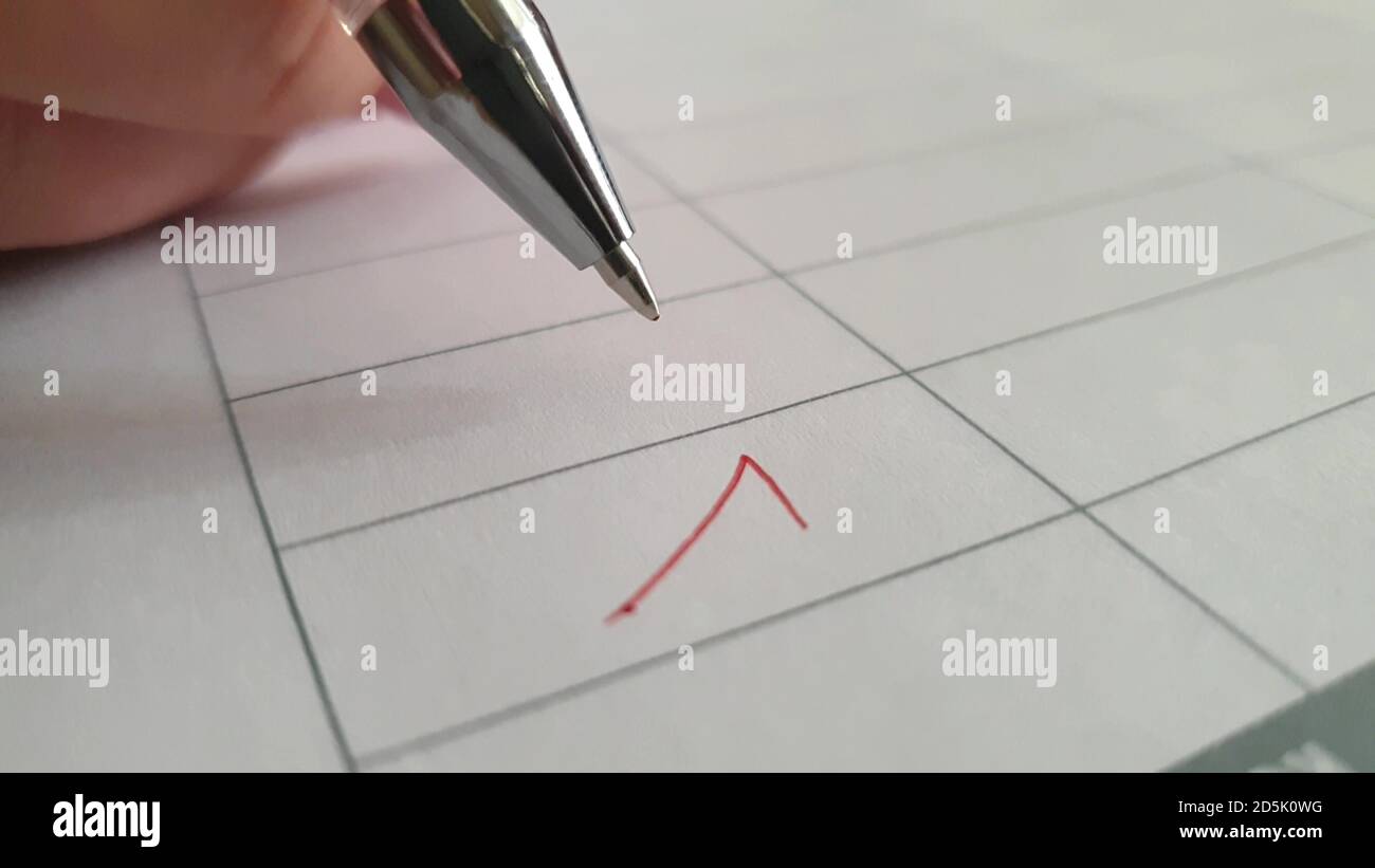 marker put a tick in the box on white paper Stock Photo - Alamy