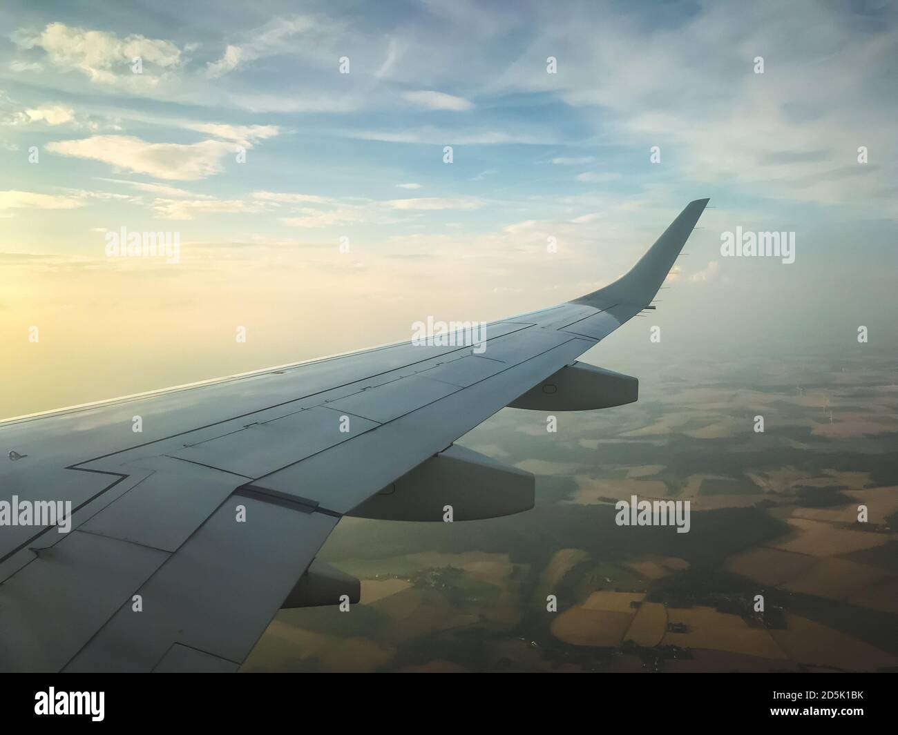 Sky and clouds view from inside an airliner plane Stock Photo - Alamy