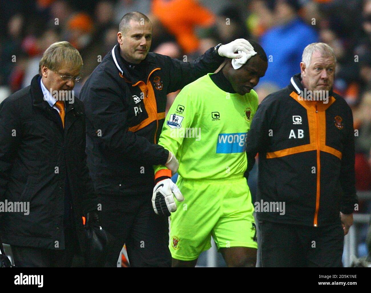 Blackpool goalkeeper Richard Kingson (centre right) is substituted ...