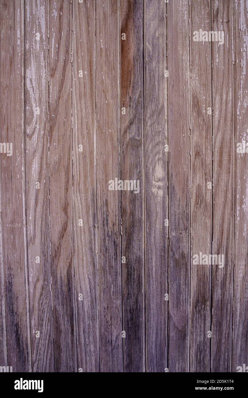 vertical photo of the texture of an old worn out wood. Retro image ...