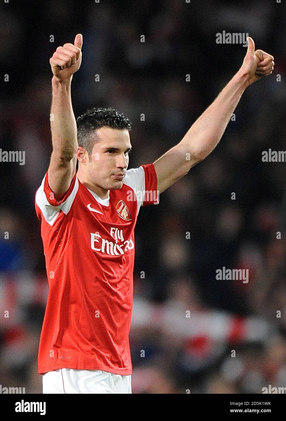 Arsenal's Robin van Persie celebrates their victory after the final ...