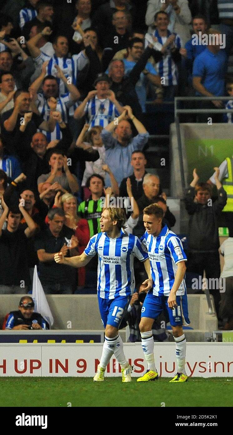 Brighton and Hove Albion's Craig Mackail-Smith (left) celebrates ...