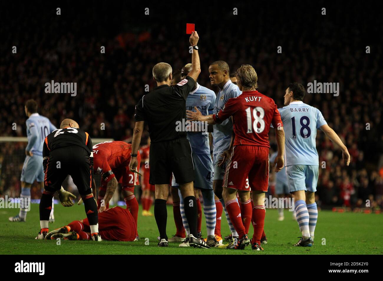 Manchester City's Mario Balotelli is sent off by referee Martin ...