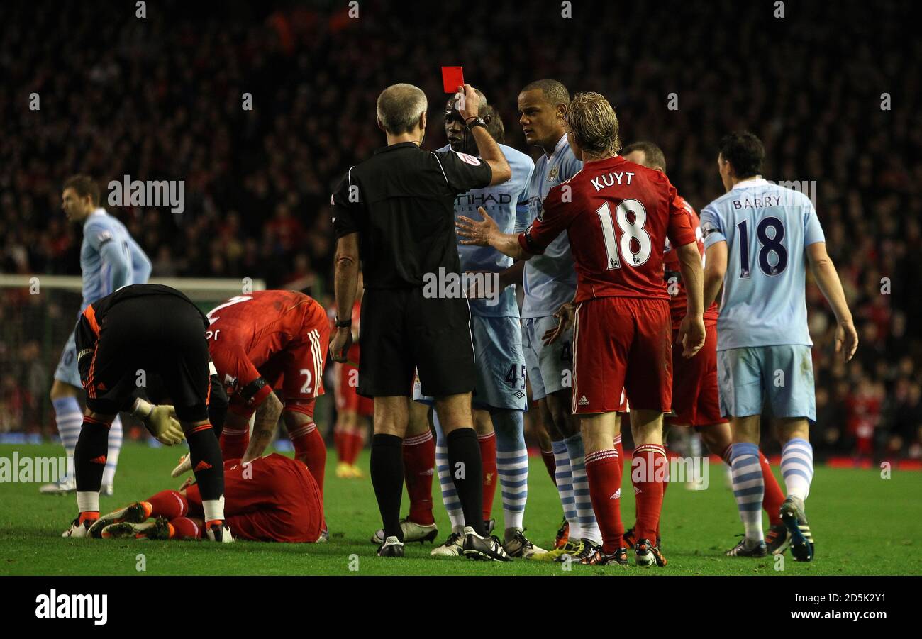 Manchester City's Mario Balotelli is sent off by referee Martin ...