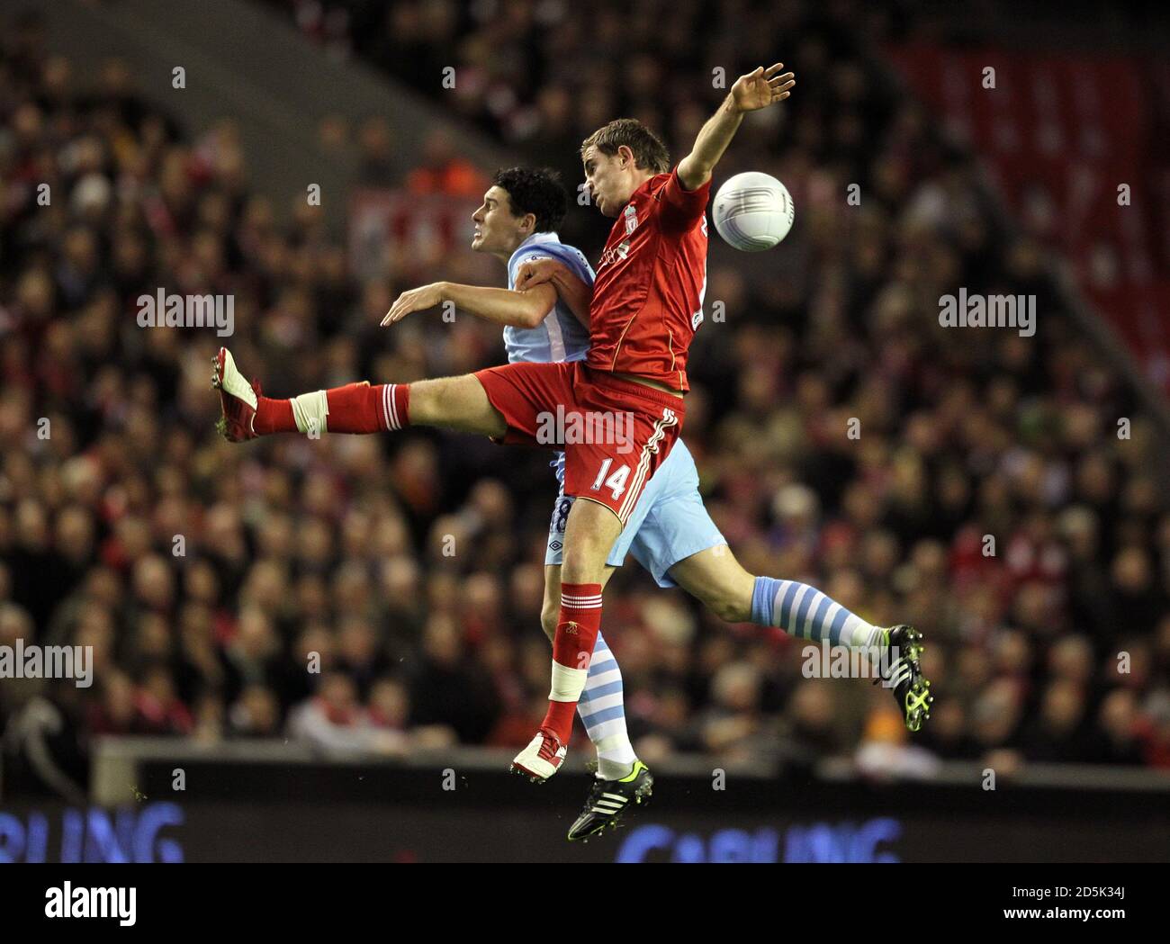 Manchester City's Gareth Barry (left) and Liverpool's Jordan Henderson ...