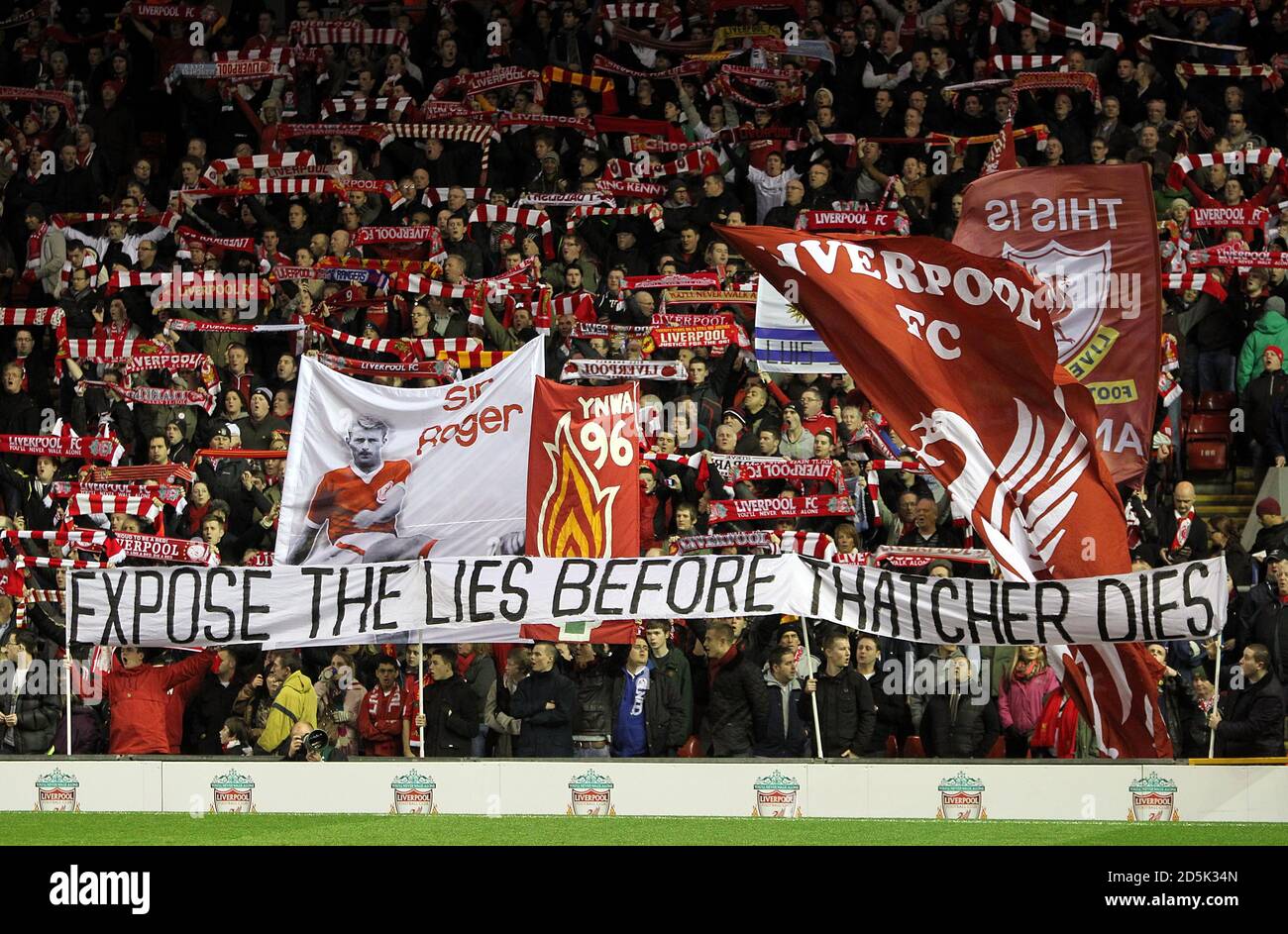 Liverpool fans hold up a banner aimed at former Prime Minister Margaret ...