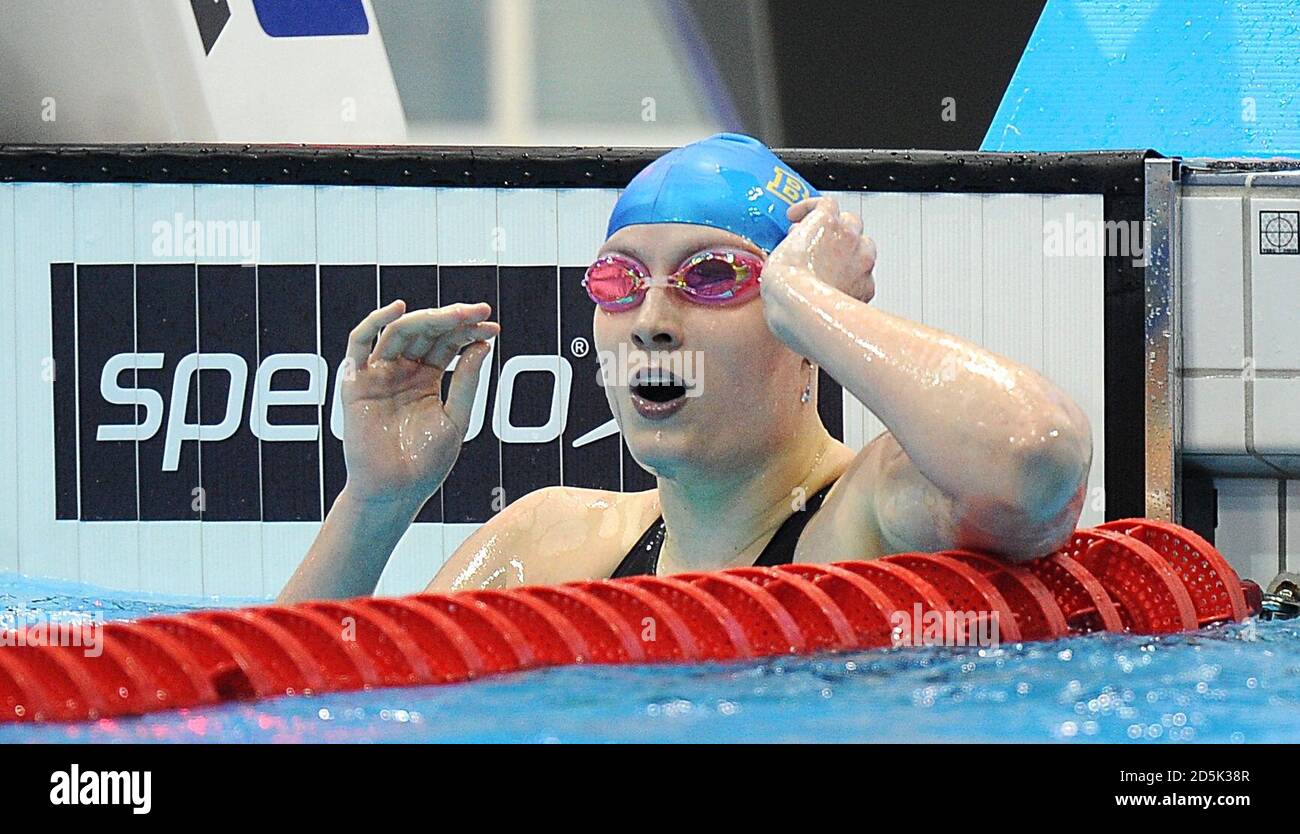 Stacey Tadd looks at the scoreboard as she breaks the English record ...