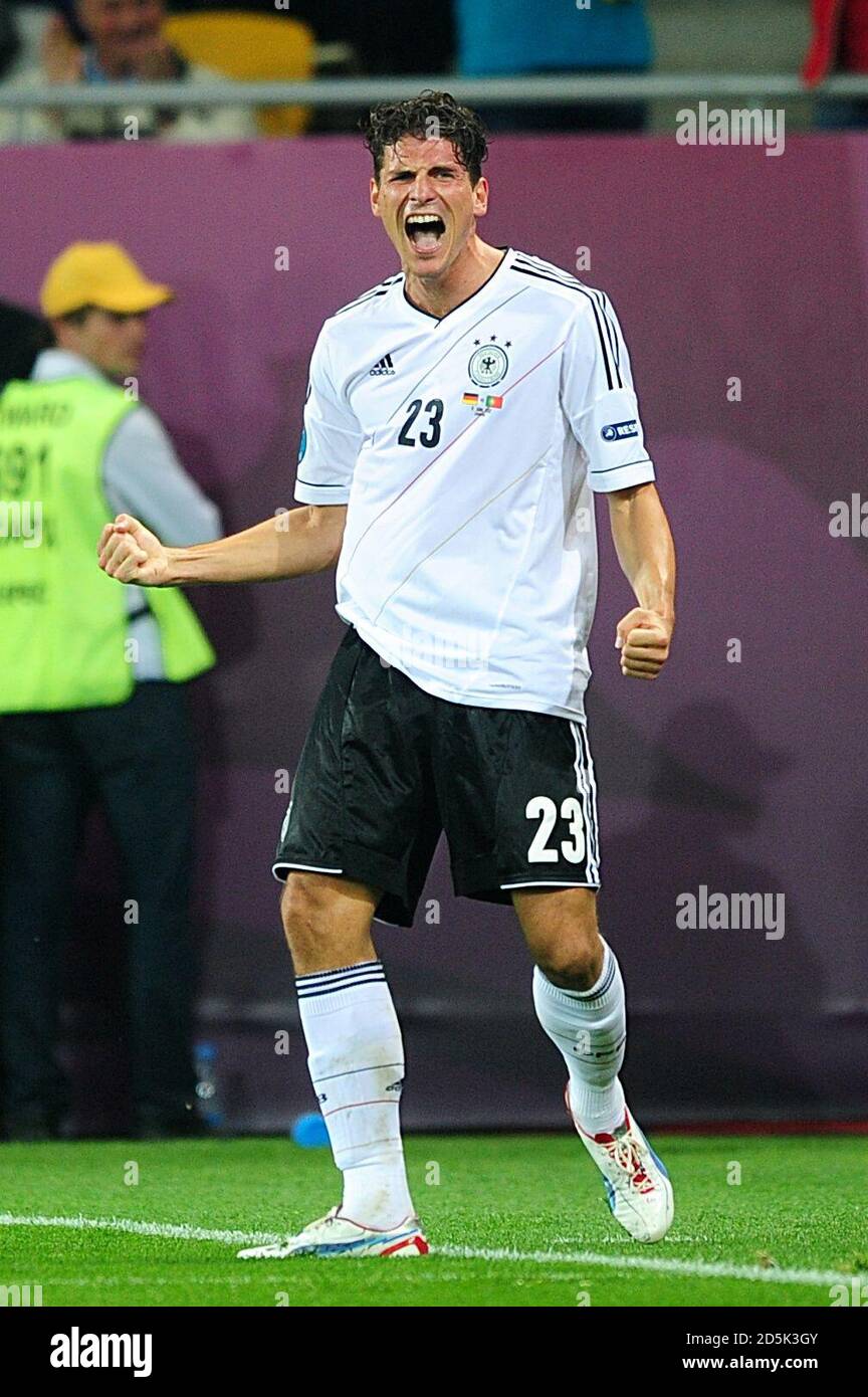 Germanys mario gomez celebrates scoring hi-res stock photography and ...