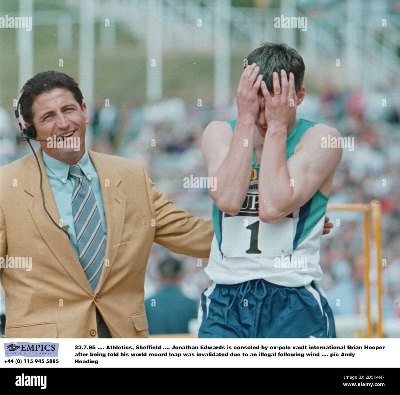 Jonathan Edwards is consoled by ex-pole vault international Brian ...