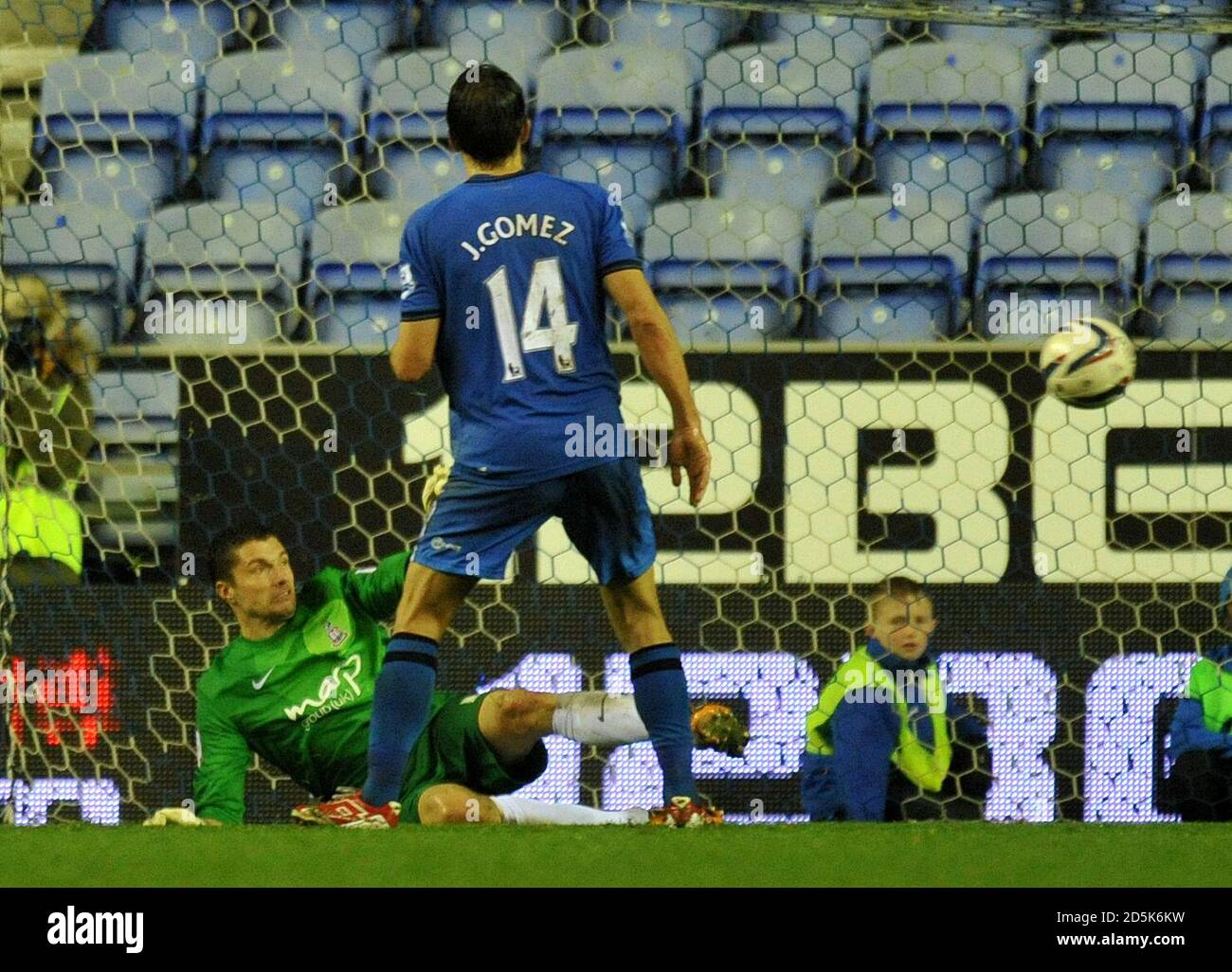 Bradford City's Matt Duke saves their winning penalty from Wigan ...