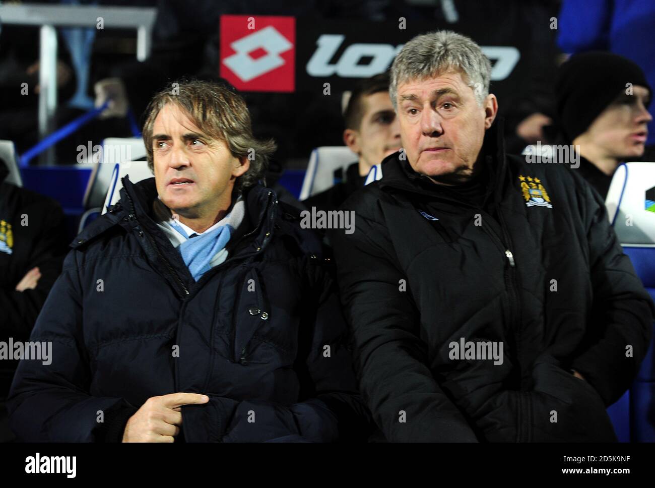 Manchester City manager Roberto Mancini (left) and assistant Brian Kidd ...