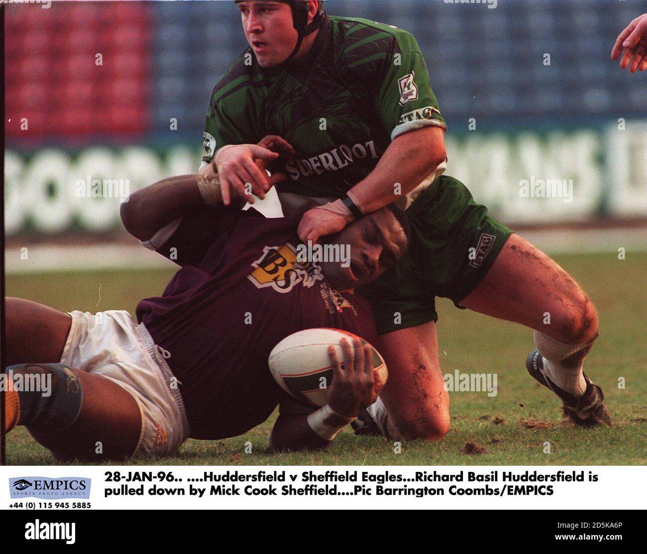 Richard Basil Huddersfield is pulled down by Mick Cook Sheffield Eagles ...
