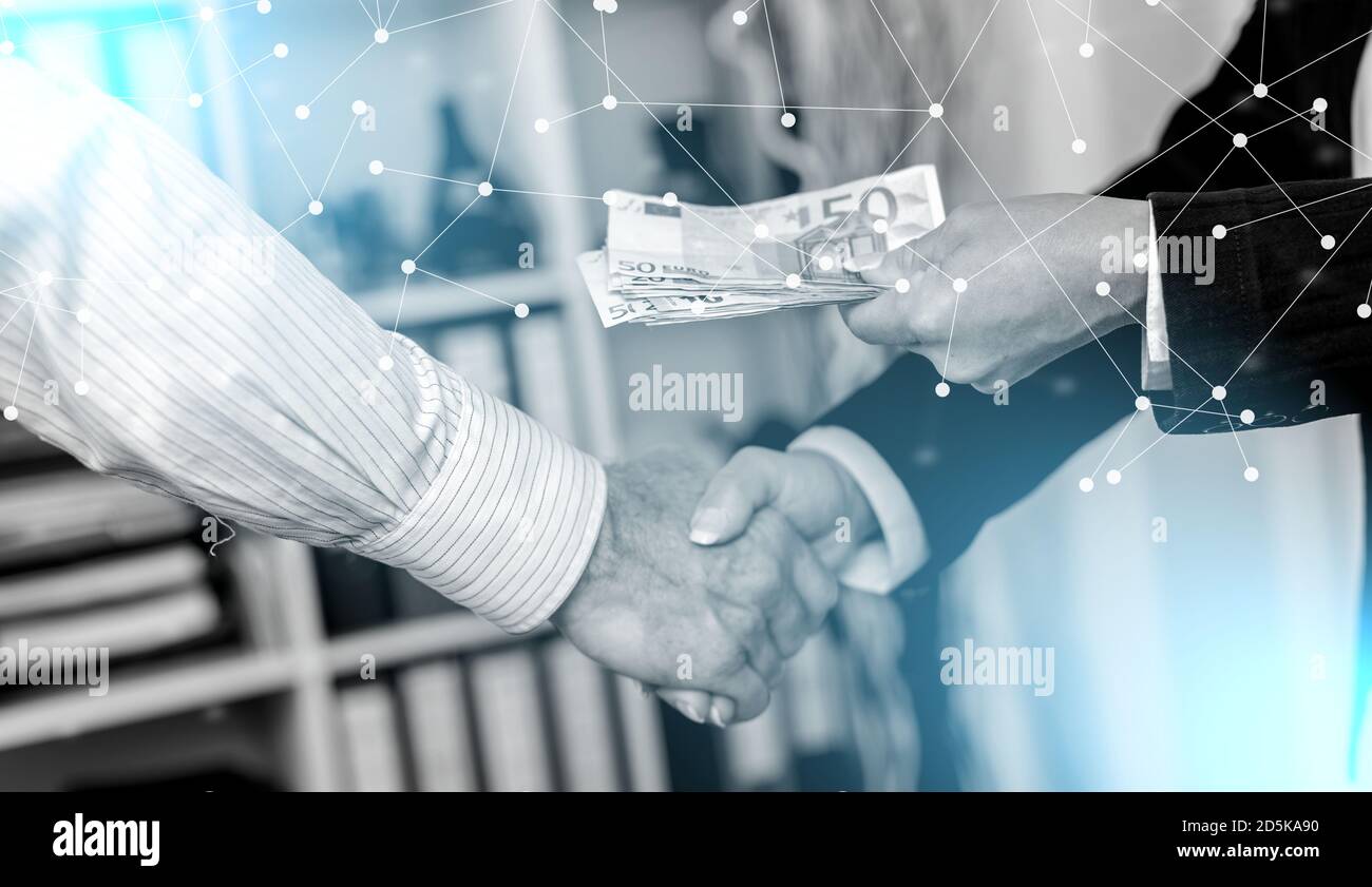 Hand shake deal with cash exchange; light effect Stock Photo - Alamy