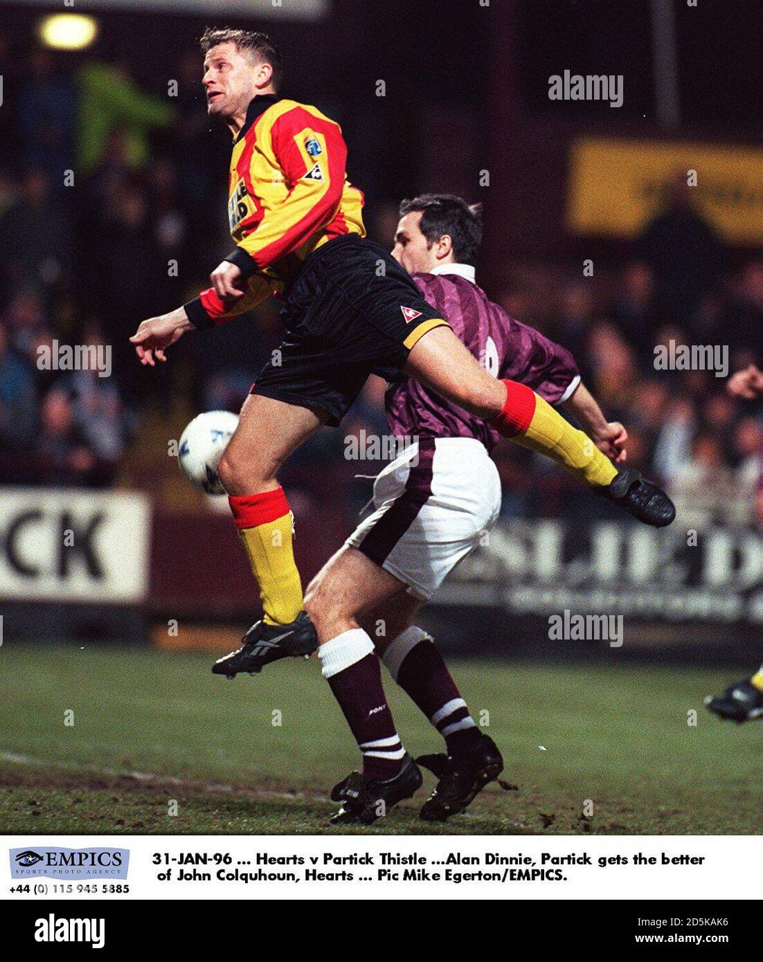 31-JAN-96 ... Hearts v Partick Thistle ...Alan Dinnie, Partick gets the ...