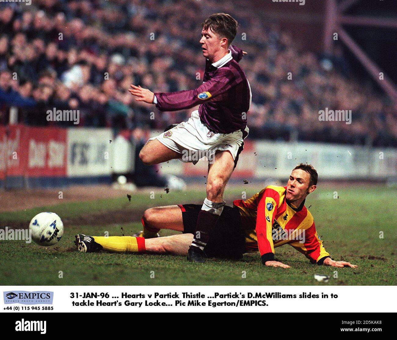 31-JAN-96 ... Hearts v Partick Thistle ...Partick's D.McWilliams slides ...