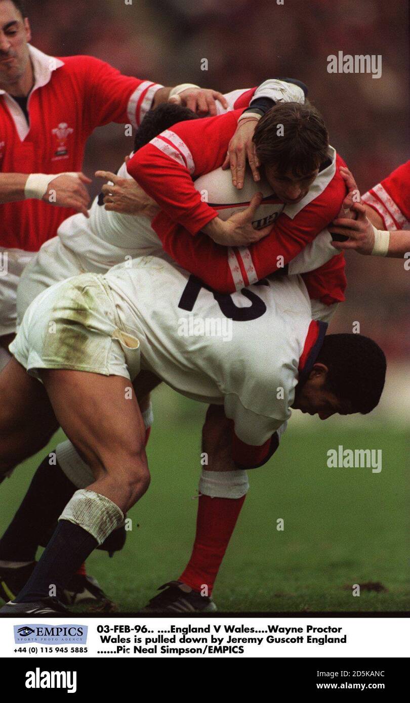 03-FEB-96. ....England v Wales. Wayne Proctor (Wales) is tackled by ...