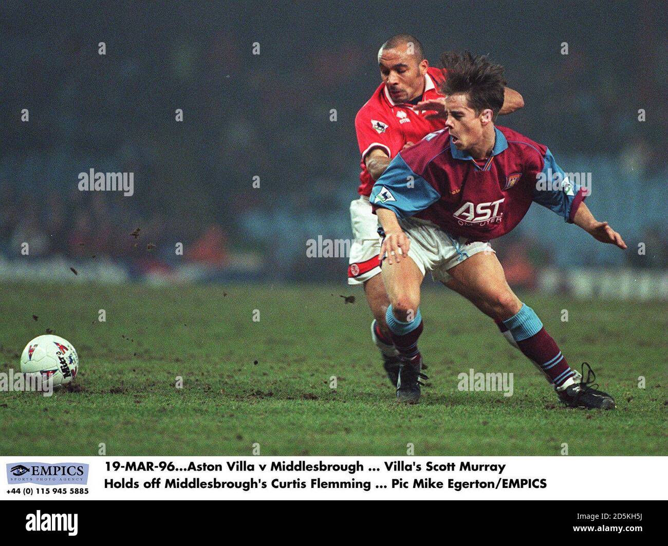 19-MAR-96. Aston Villa v Middlesbrough ... Villa's Hendry holds off ...