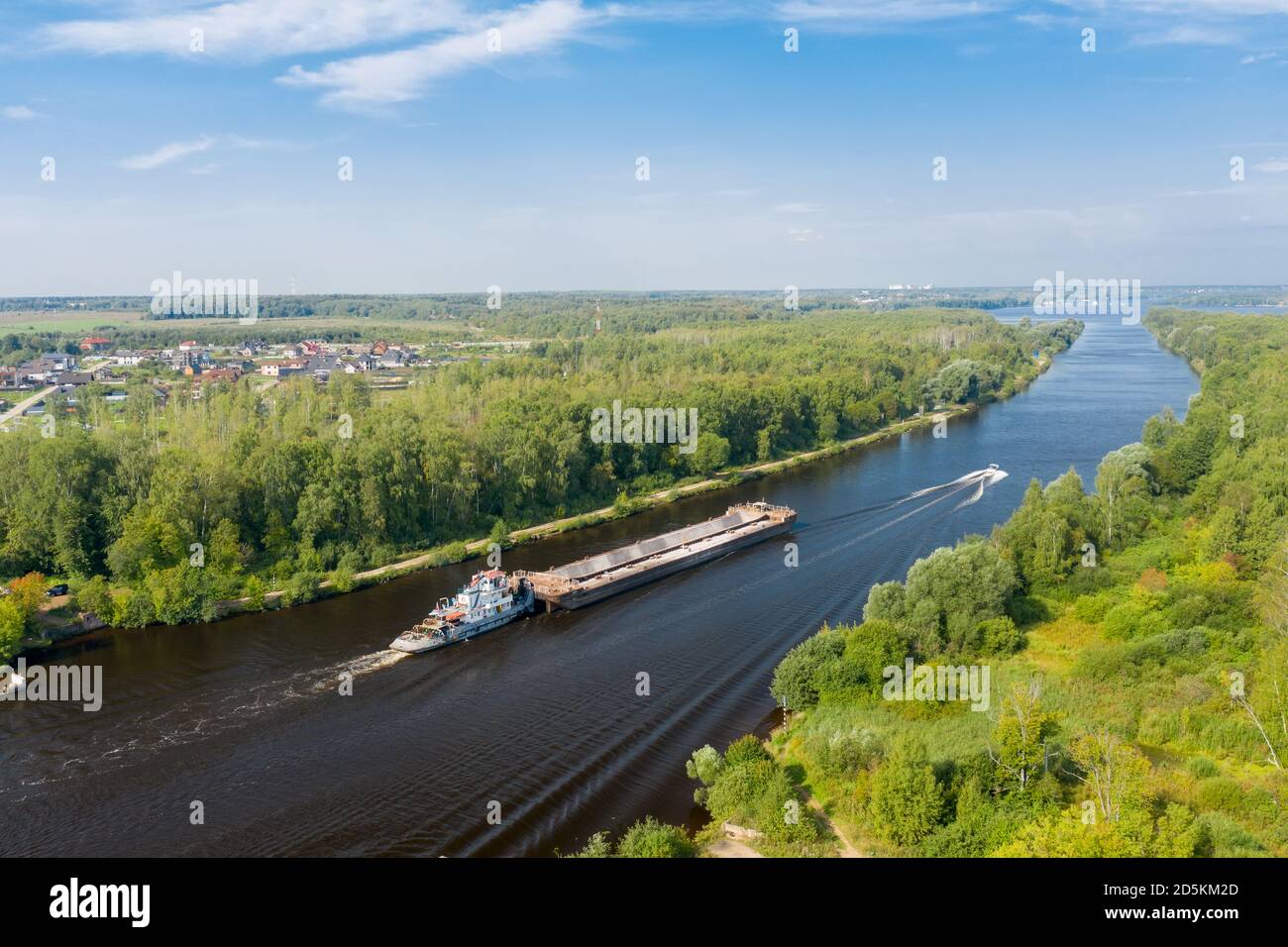 Top view of a water channel and a moving barge Stock Photo - Alamy