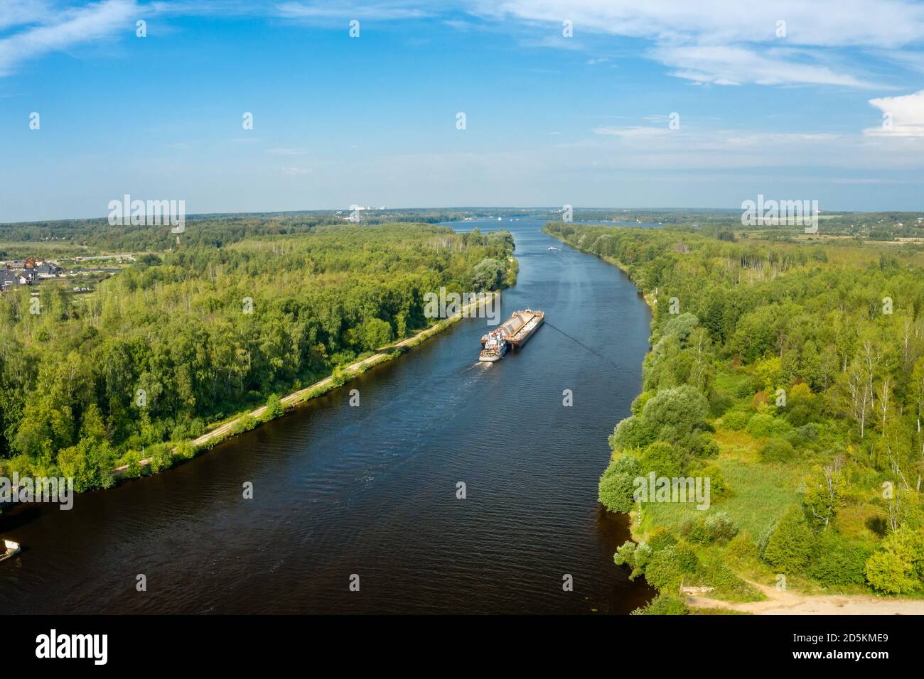Top view of a water channel and a moving barge Stock Photo - Alamy