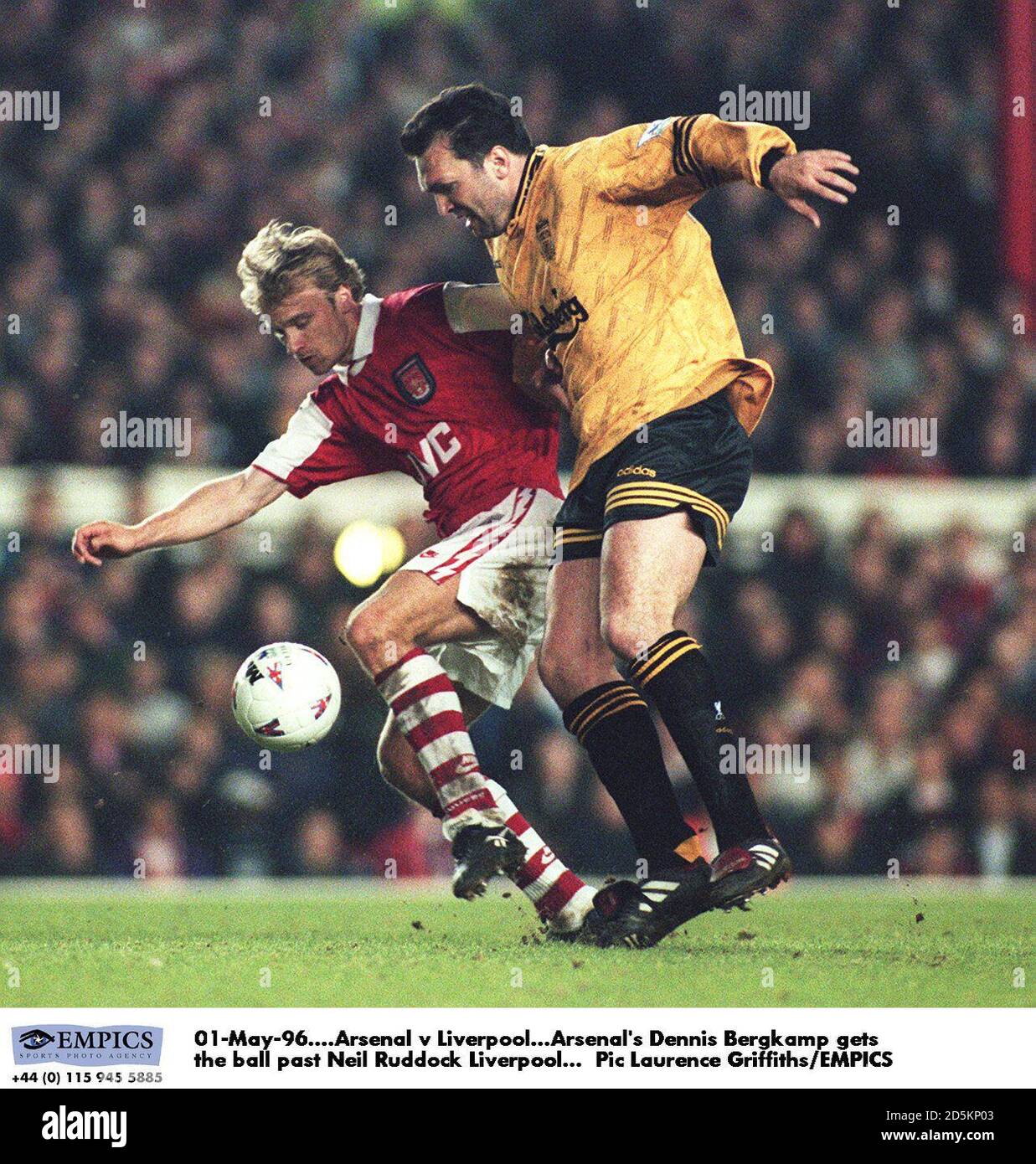 Arsenal's Dennis Bergkamp gets the ball past Neil Ruddock Liverpool ...