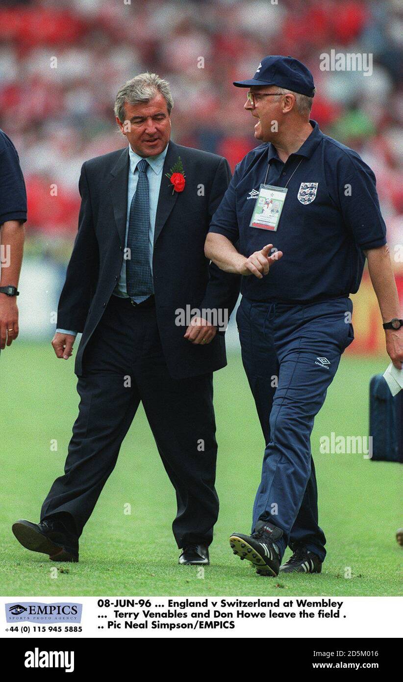 Terry Venables and Don Howe leave the field Stock Photo - Alamy