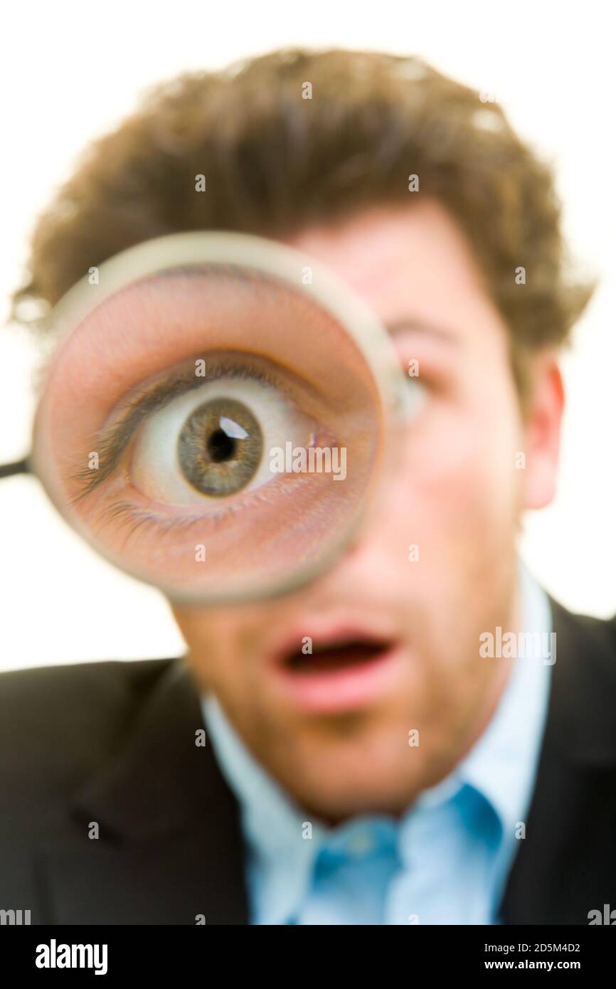 Man with big magnifying glass hi-res stock photography and images - Alamy