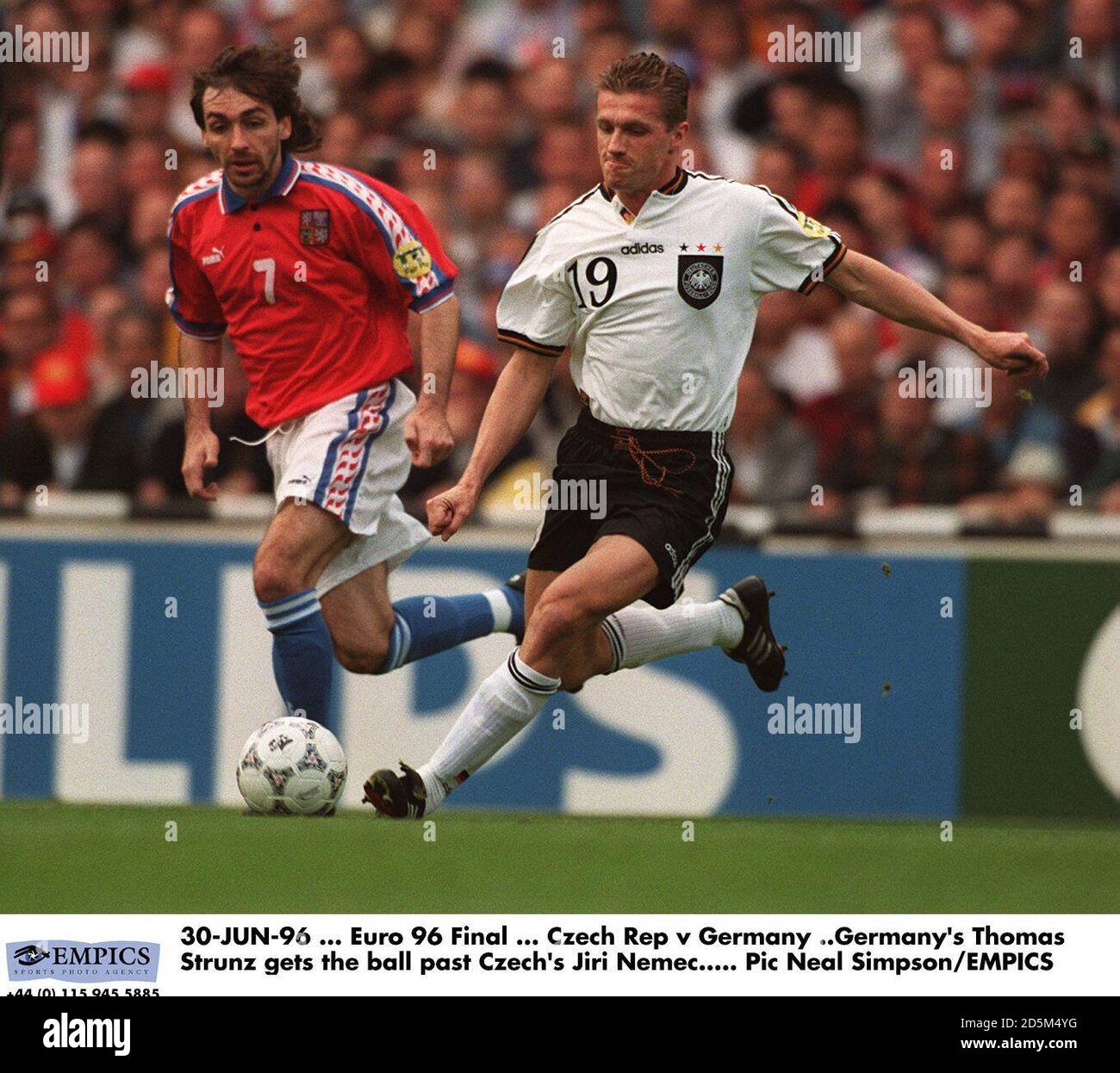 Germany's Thomas Strunz gets the ball past Czech's Jiri Nemec Stock ...