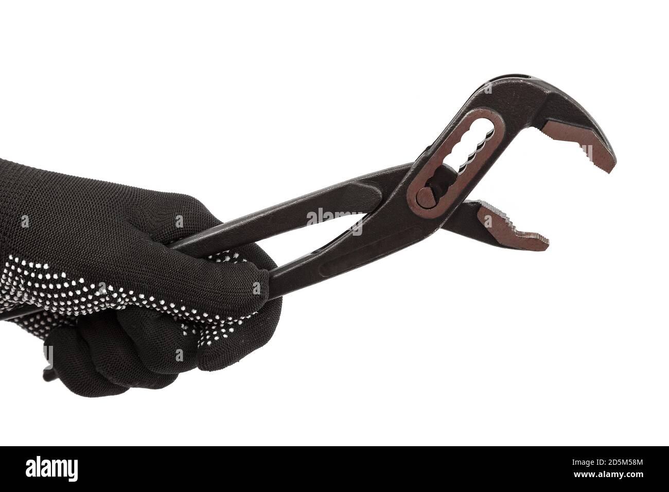 Spanner tool in hand with glove isolated on white background Stock ...