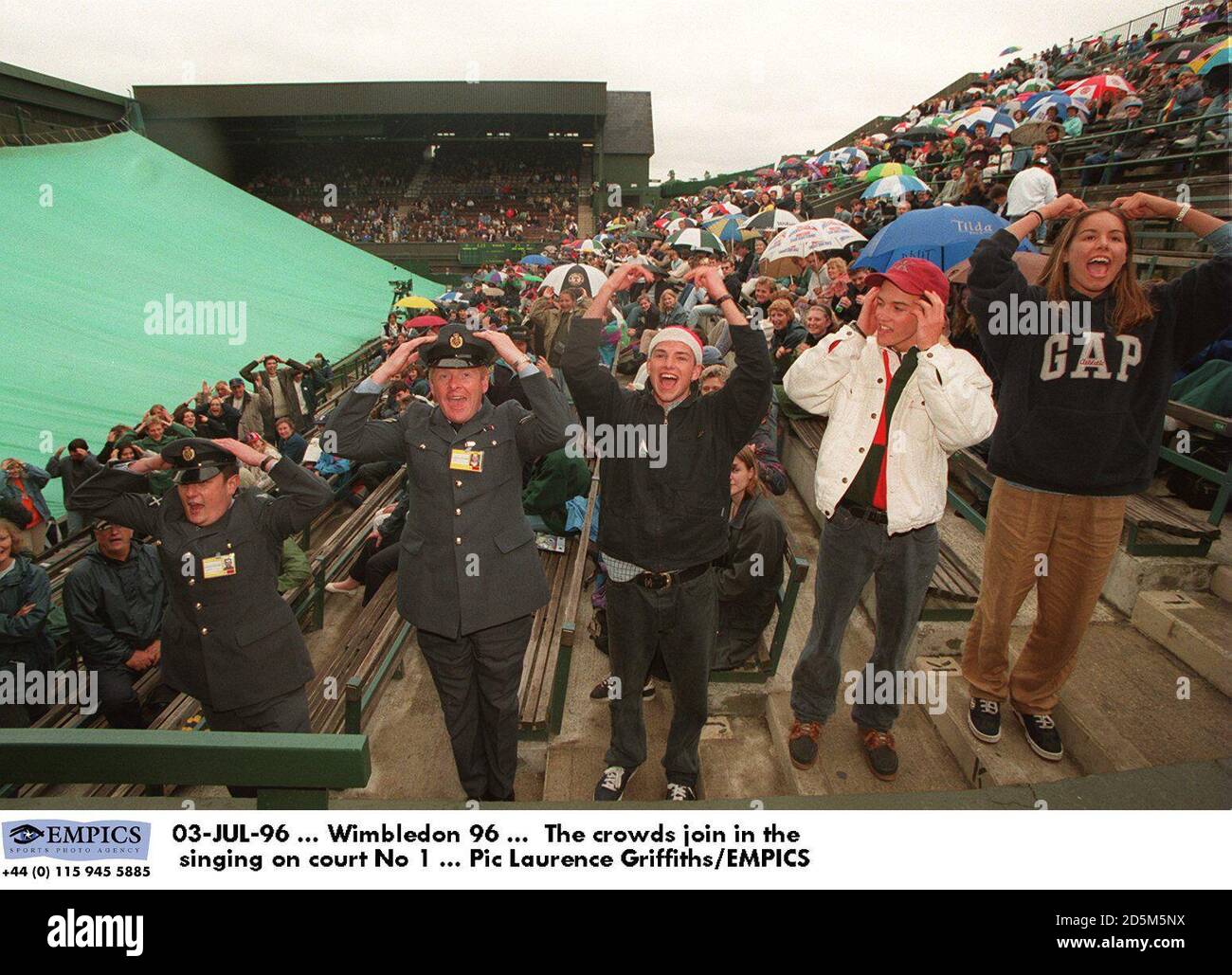 03-JUL-96 ... Wimbledon 96 ... The crowds join in the singing on court ...