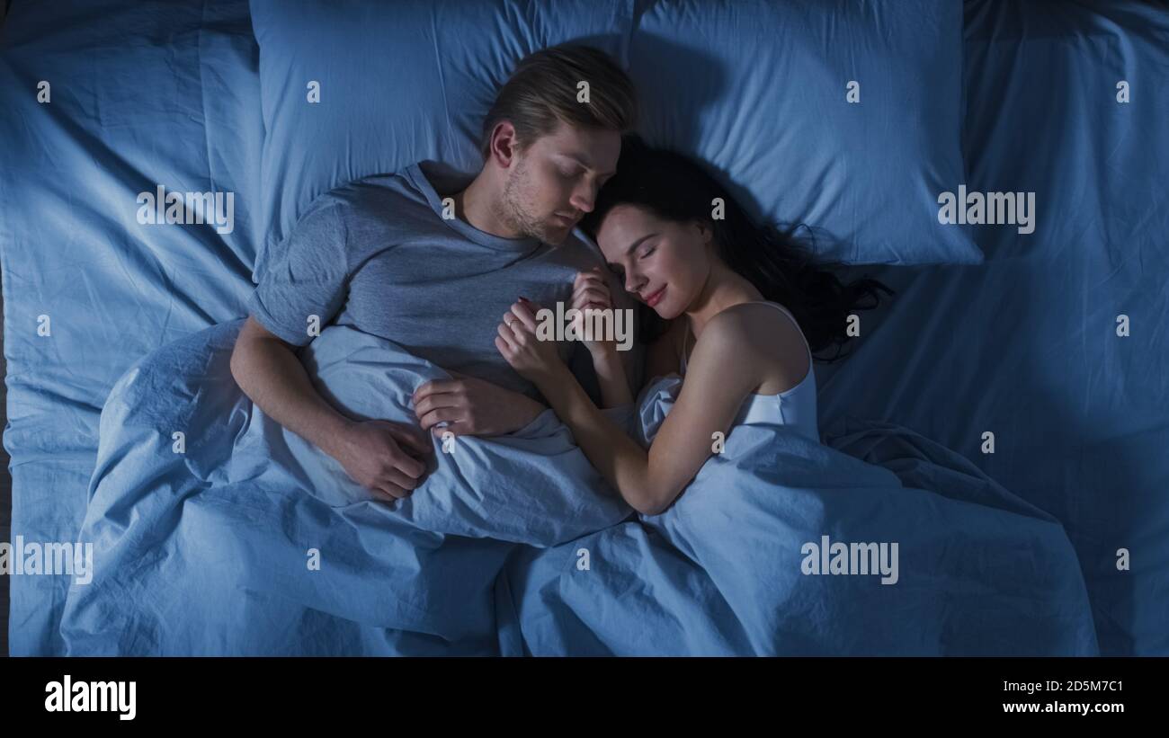 Man woman sleeping bed above hi-res stock photography and images - Alamy