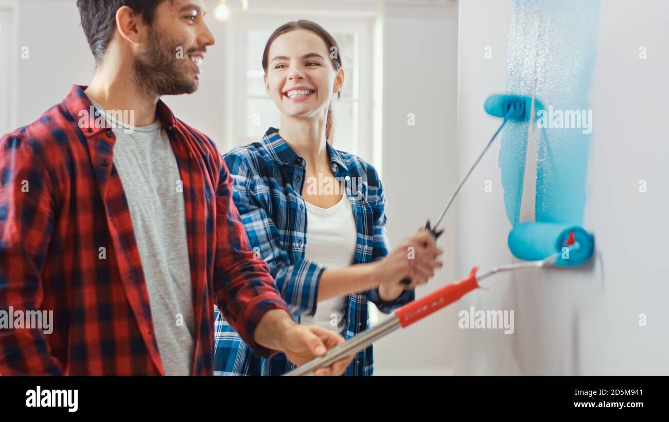 Close Up Shot of a Wall Being Painted with a Roller. Color of the Paint ...
