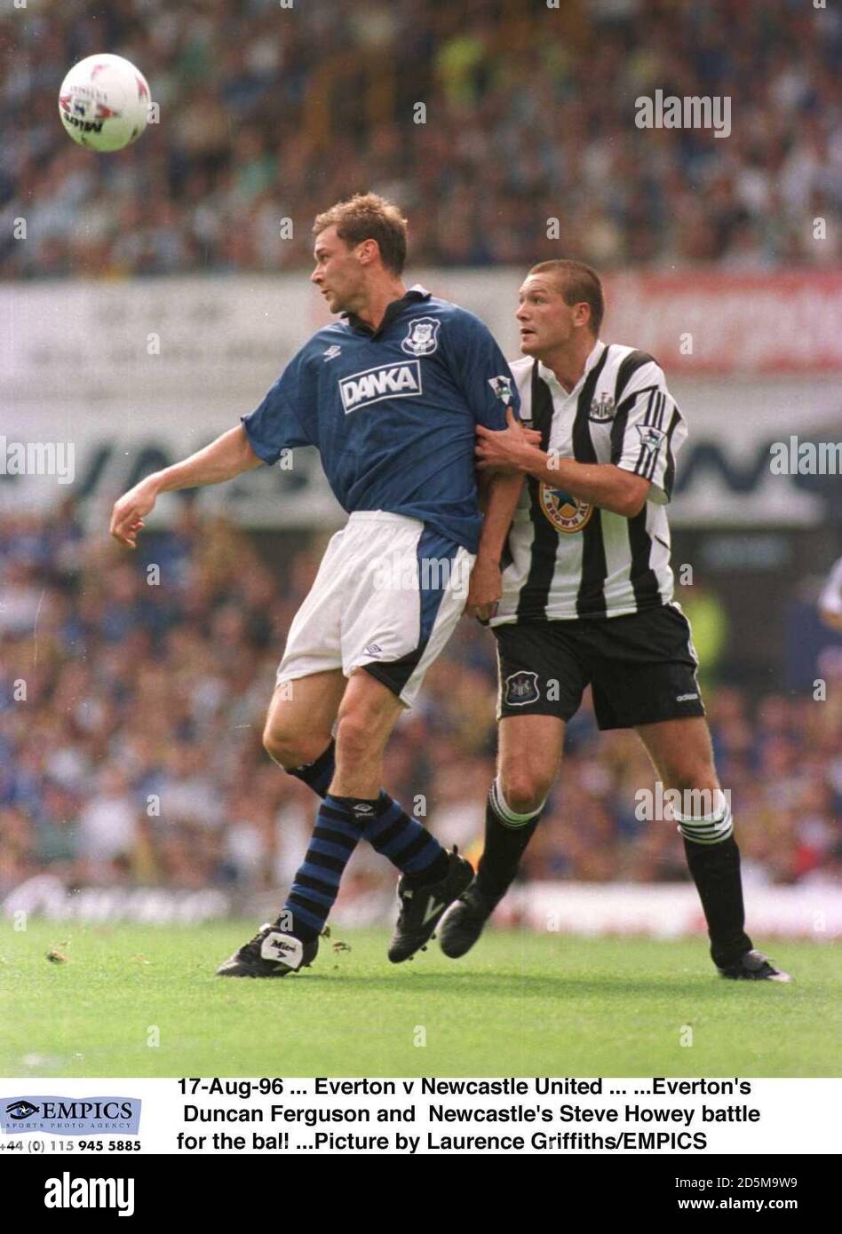 Everton's Duncan Ferguson and Newcastle's Steve Howey battle for the ...