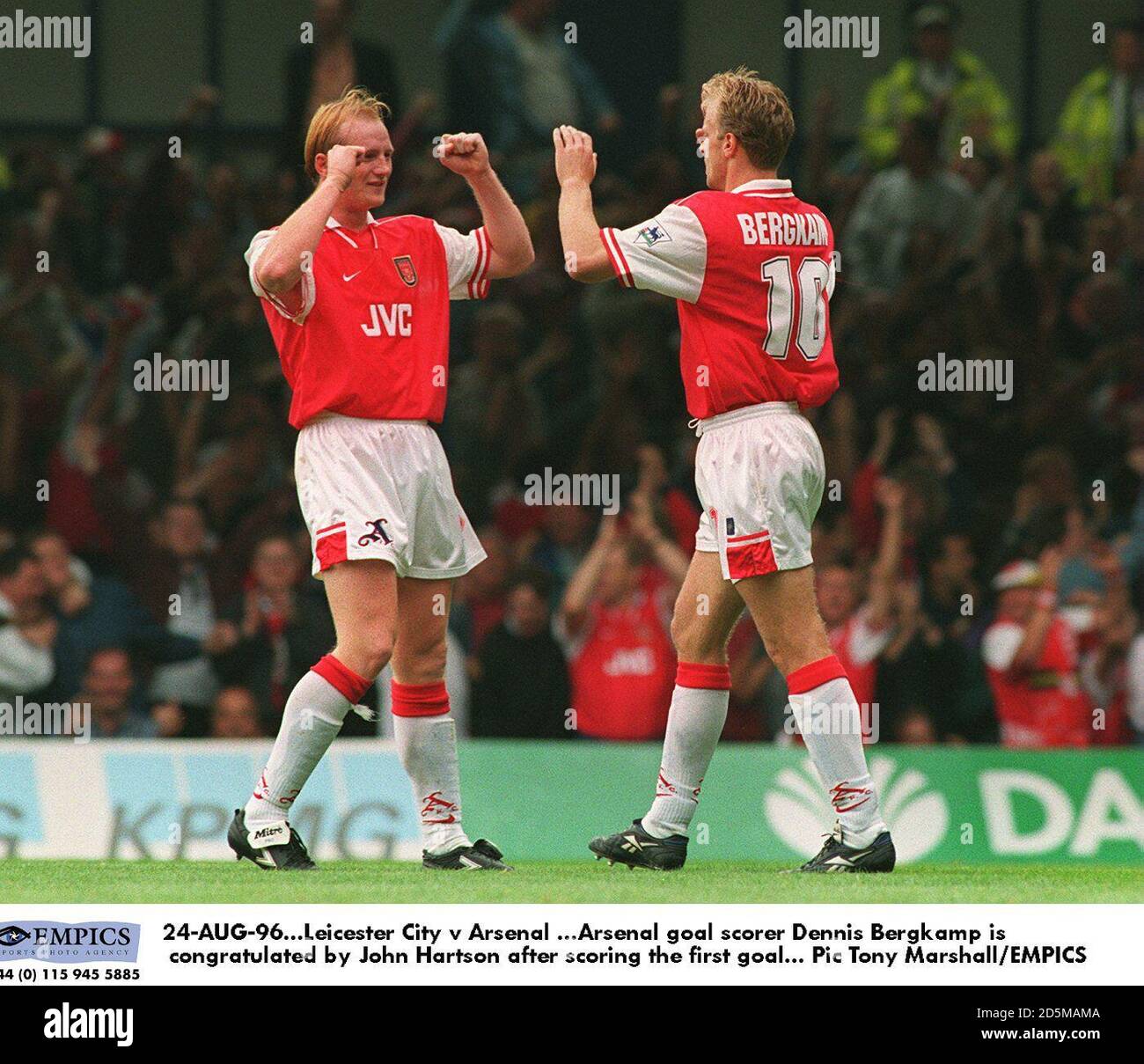 Arsenal's Dennis Bergkamp is congratulated by John Hartson after ...