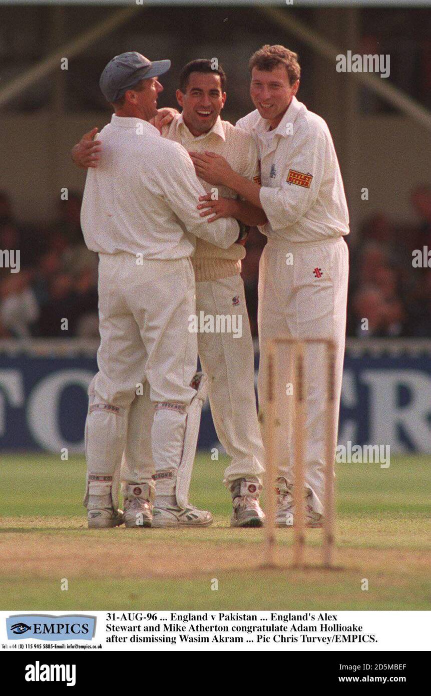 Englan's Alec Stewart and Mike Atherton congratulate Adam Hollioake ...