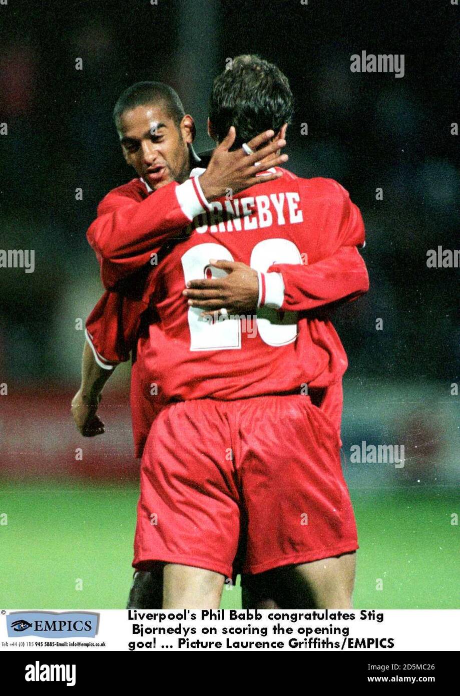 Liverpool's Phil Babb congratulates Stig Bjornedye on scoring the ...