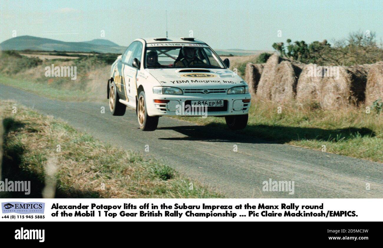 Alexander Potapov lifts off in the Subaru Impreza at the Manx Rally ...