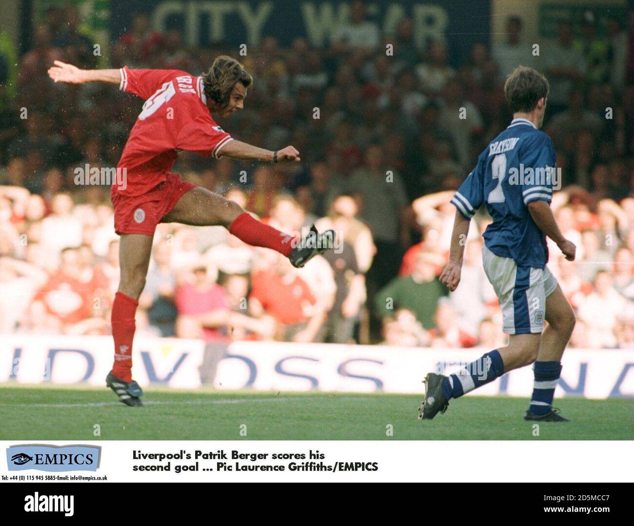 Liverpool's Patrik Berger scores his second goal Stock Photo - Alamy