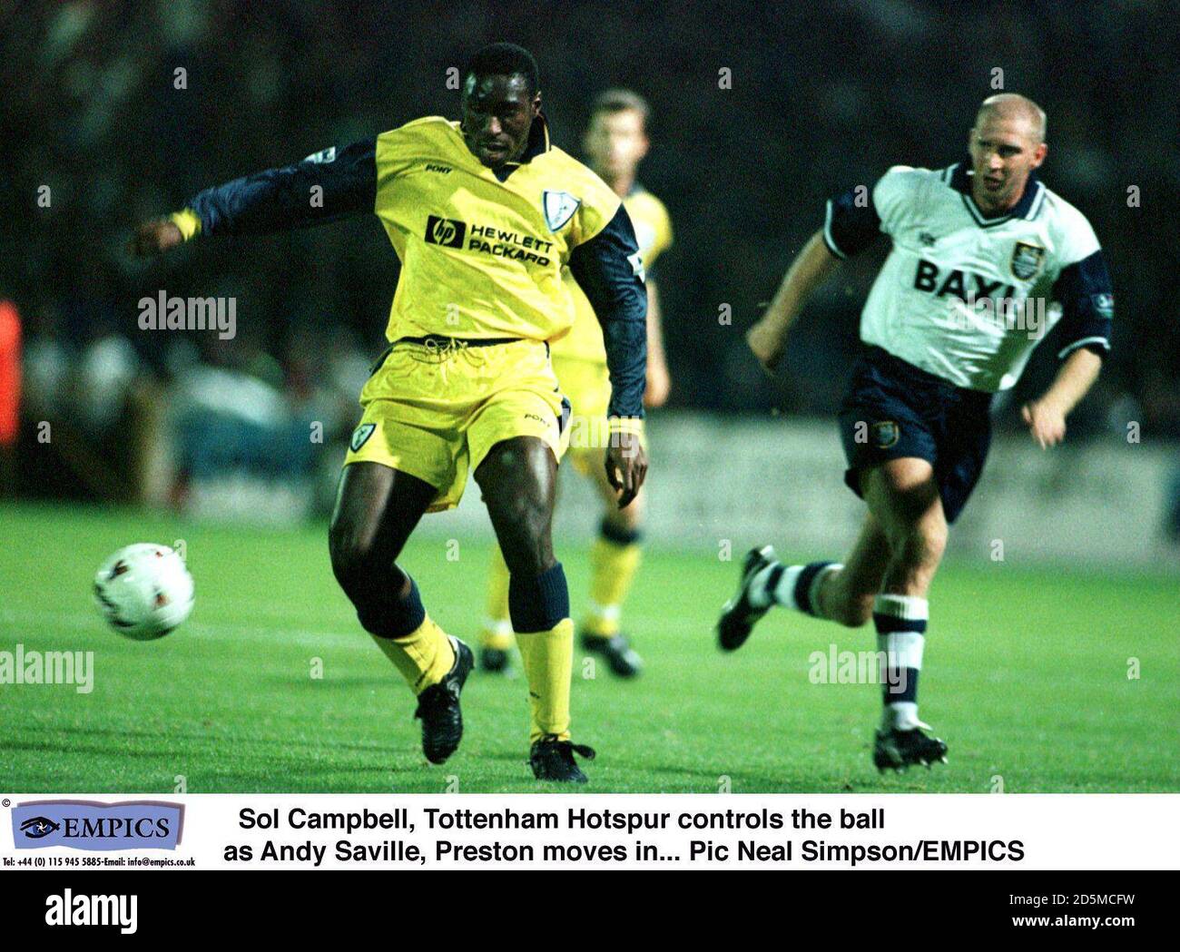 Sol Campbell, Tottenham Hotspur controls the ball as Andy Saville ...
