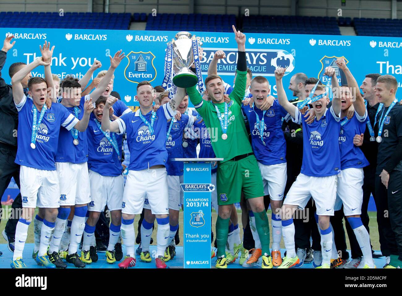 Everton's captain Russell Griffiths lifts the trophy with the winning ...