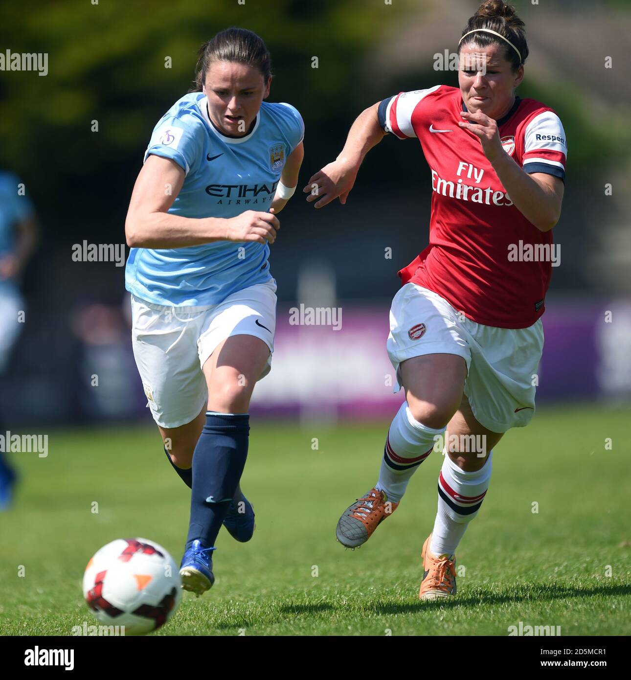 Arsenal's Emma Mitchell (right) and Manchester City's Krystle Johnstone ...