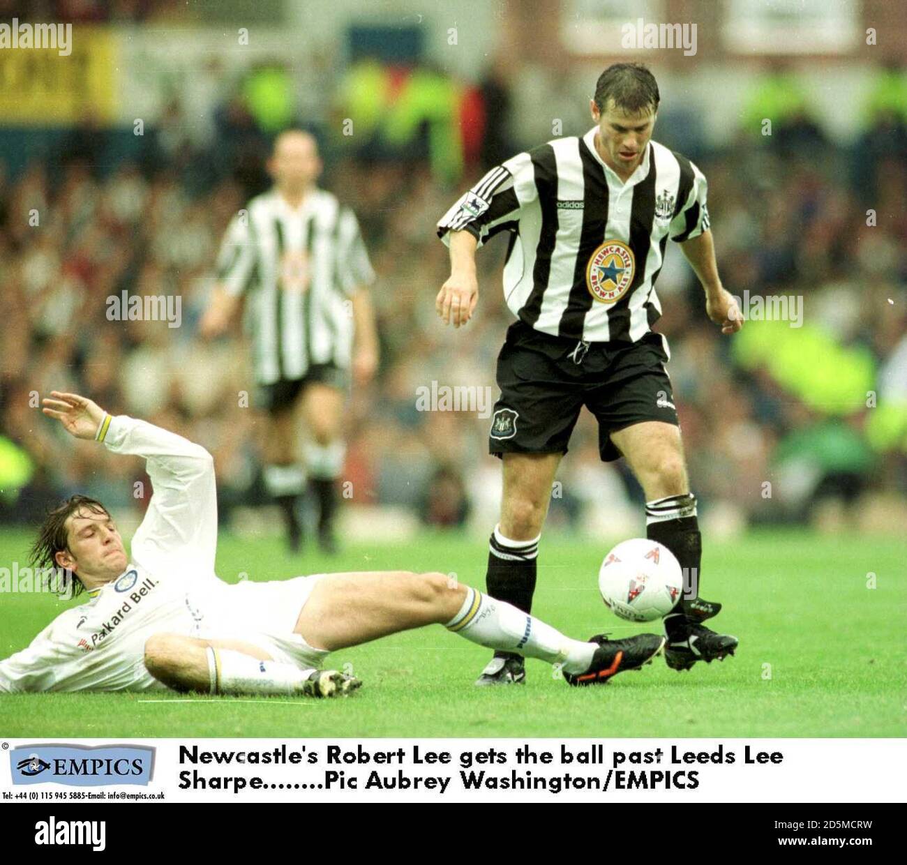 Newcastle's Robert Lee gets the ball past Leeds Lee Sharpe Stock Photo ...